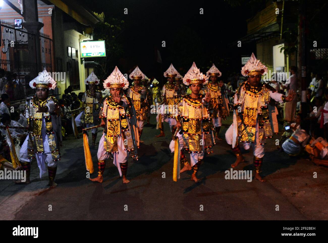 Balinese male dancers dancing during a temple festival in Ubud, Bali ...