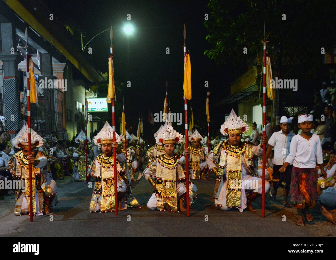 Balinese male dancers dancing during a temple festival in Ubud, Bali ...