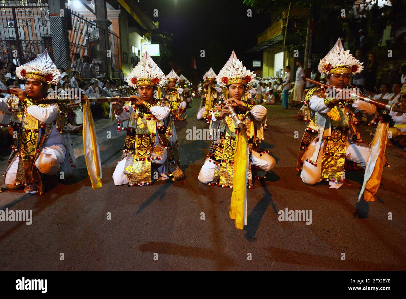 Balinese male dancers dancing during a temple festival in Ubud, Bali ...
