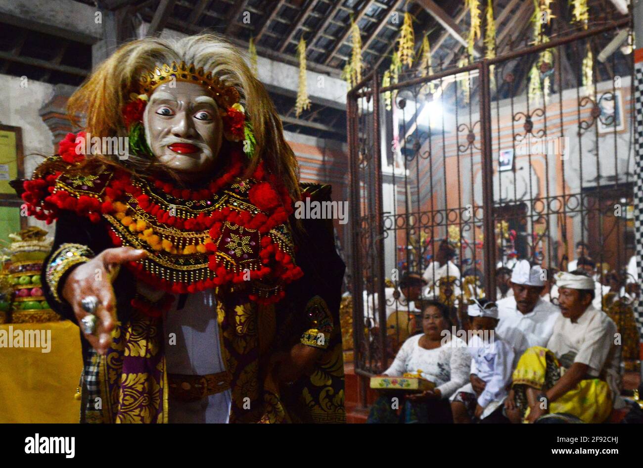 A masked topeng performer at a temple festival in Ubud, Bali, Indonesia ...