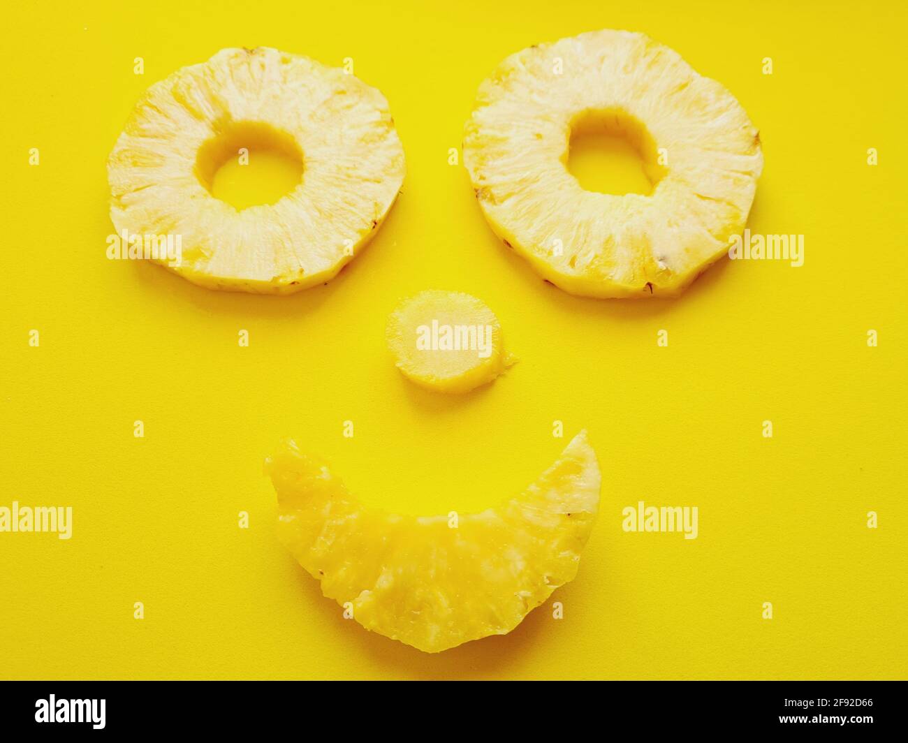 Cut pineapple face hi-res stock photography and images - Alamy