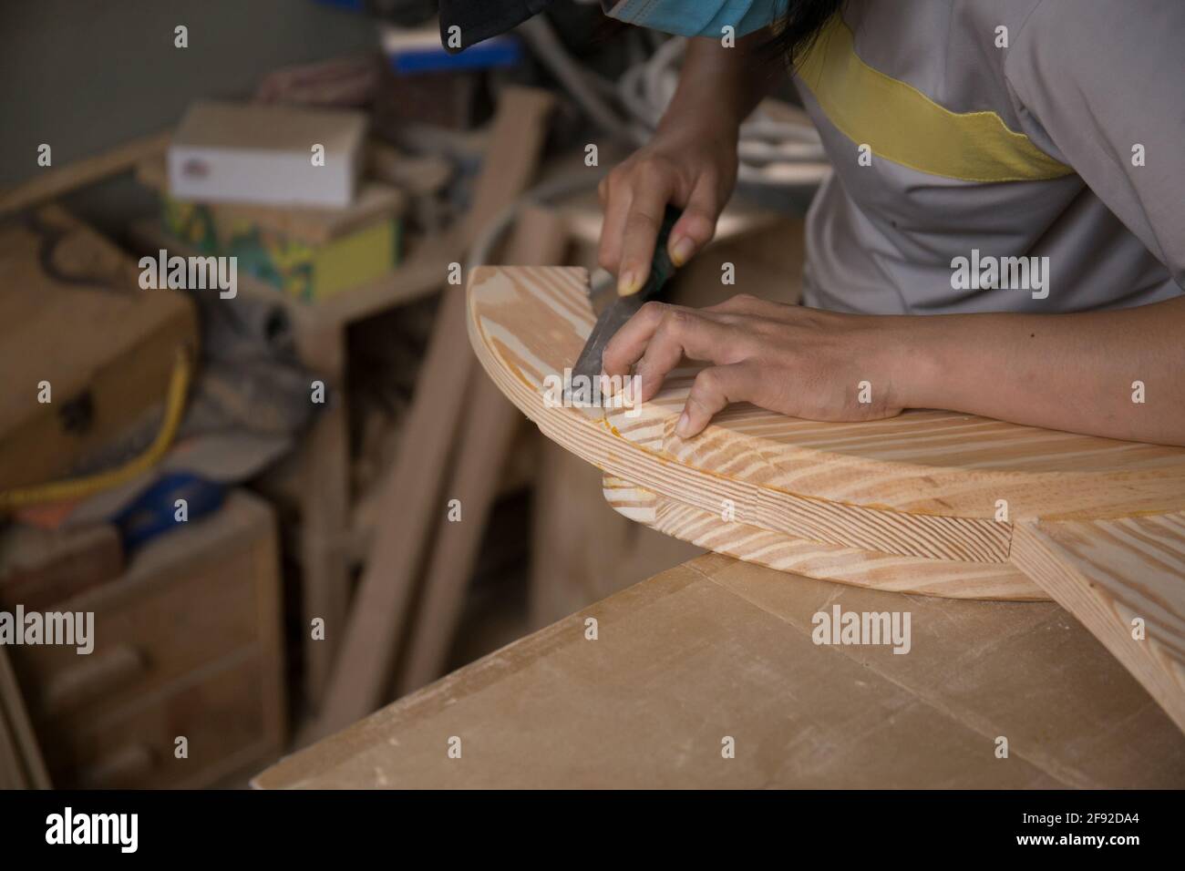Carpenter working in the workshop with a cutter Stock Photo - Alamy
