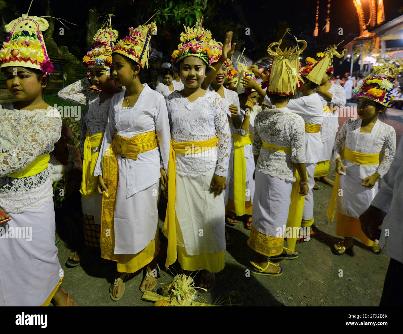 Balinese girl dancers performing at a cultural temple festival in Ubud ...