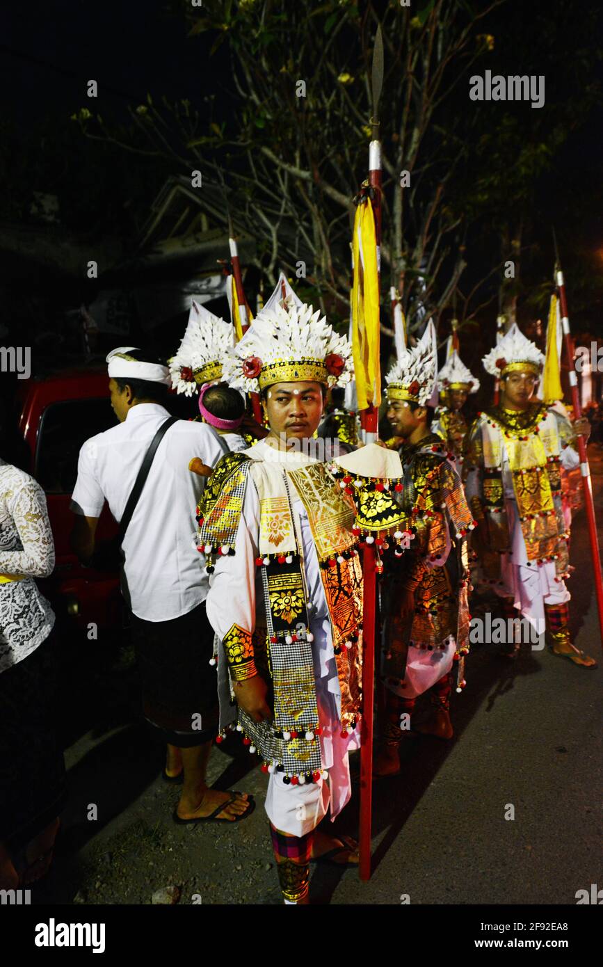 Balinese male dancers dancing during a temple festival in Ubud, Bali ...