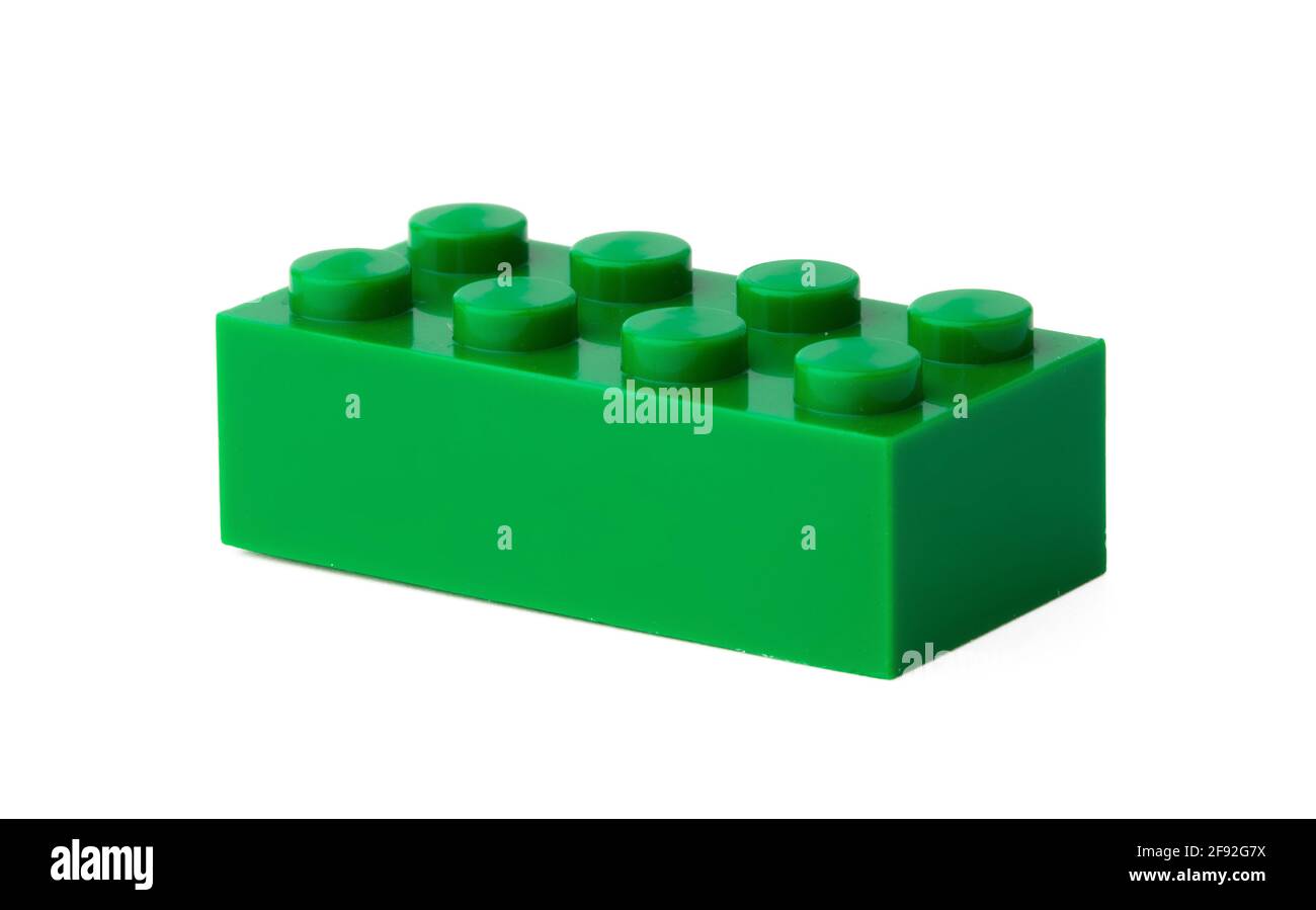Green plastic building block isolated on white Stock Photo - Alamy