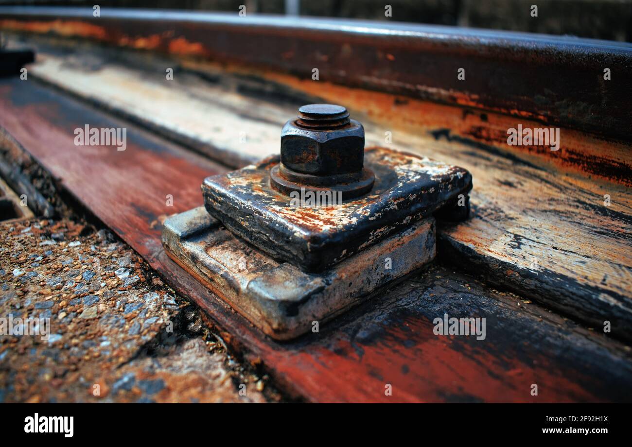 The rusty iron bolts on the railway Stock Photo - Alamy
