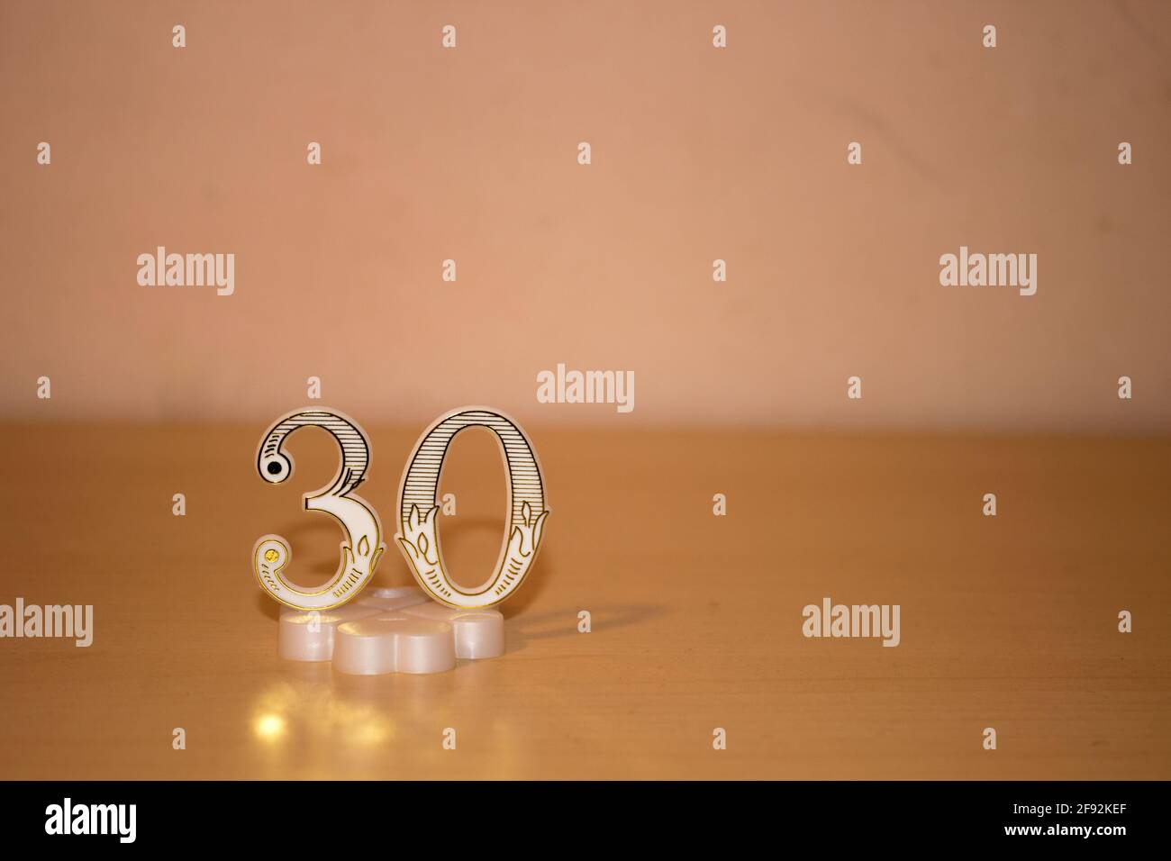 Decorative number 30 object on a desk Stock Photo - Alamy