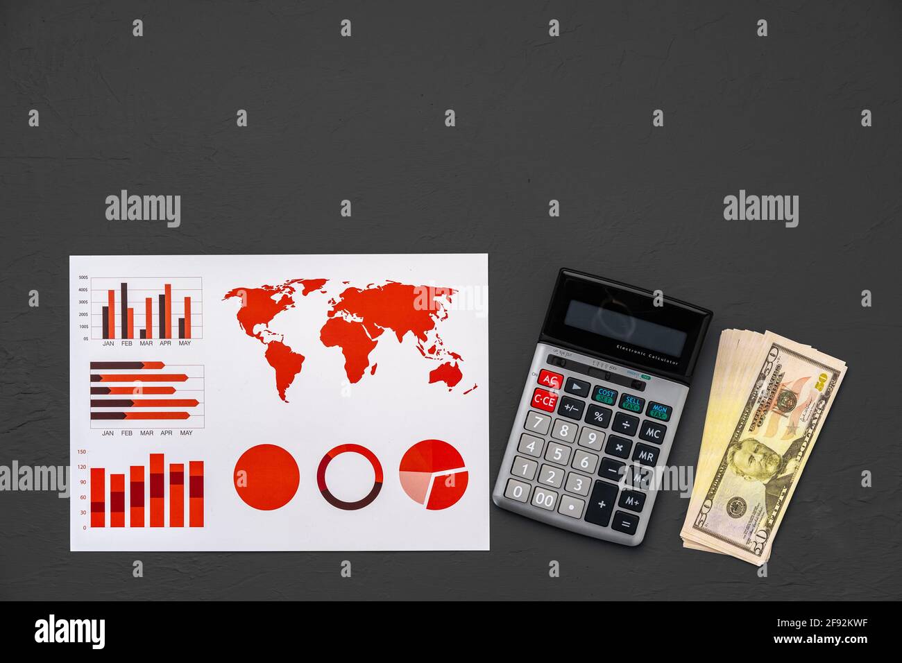 Financial paper with charts and diagrams on gray table Stock Photo - Alamy