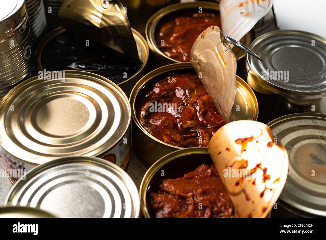 Many tin cans fish hi-res stock photography and images - Alamy