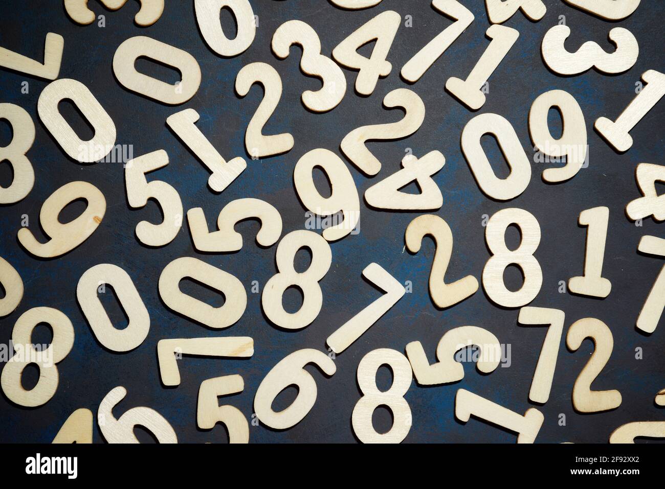Wood numbers on a table Stock Photo - Alamy