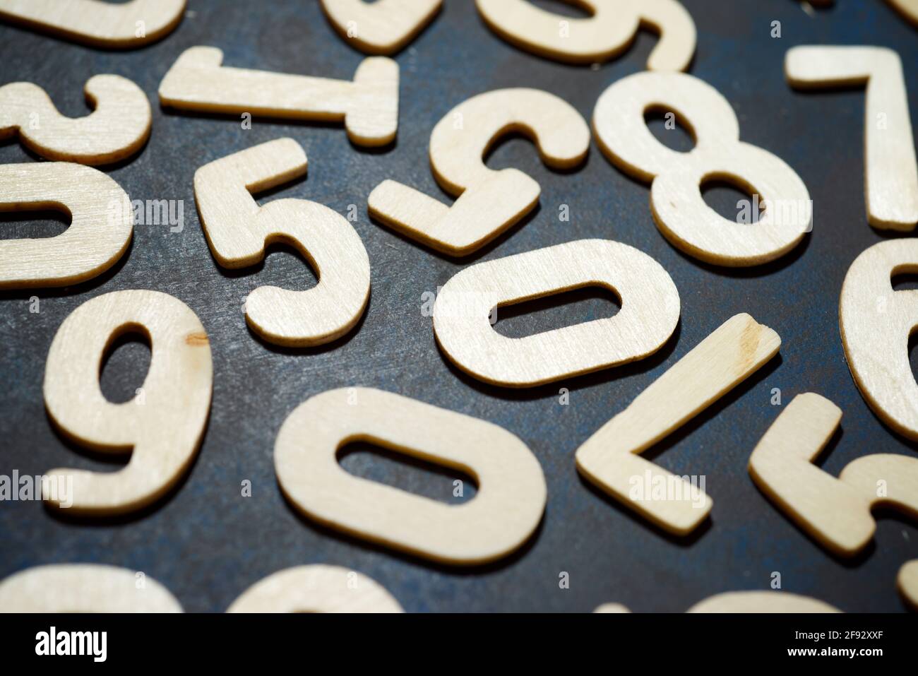 Wood numbers on a table Stock Photo - Alamy