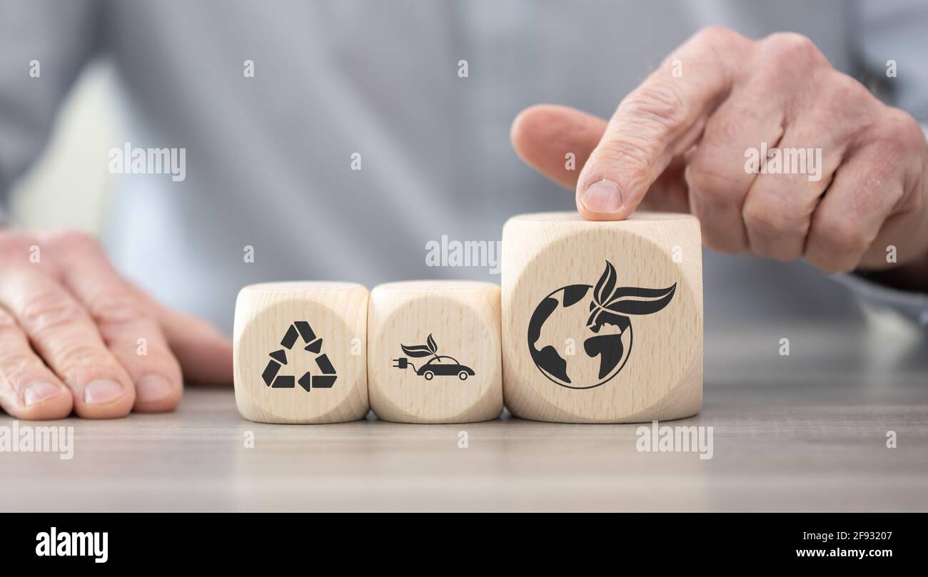 Wooden blocks with symbol of ecology concept Stock Photo - Alamy