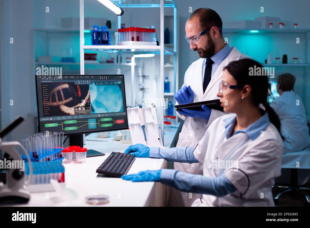 Analyzing medical data doctors using hi-res stock photography and ...