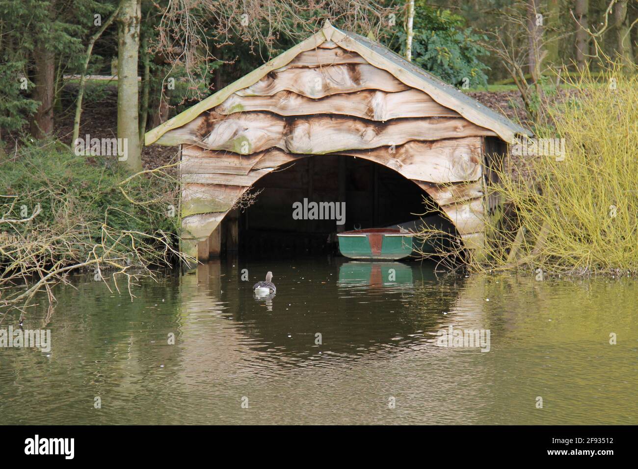 A Traditional Small Wooden Lakeside Boat House Stock Photo - Alamy