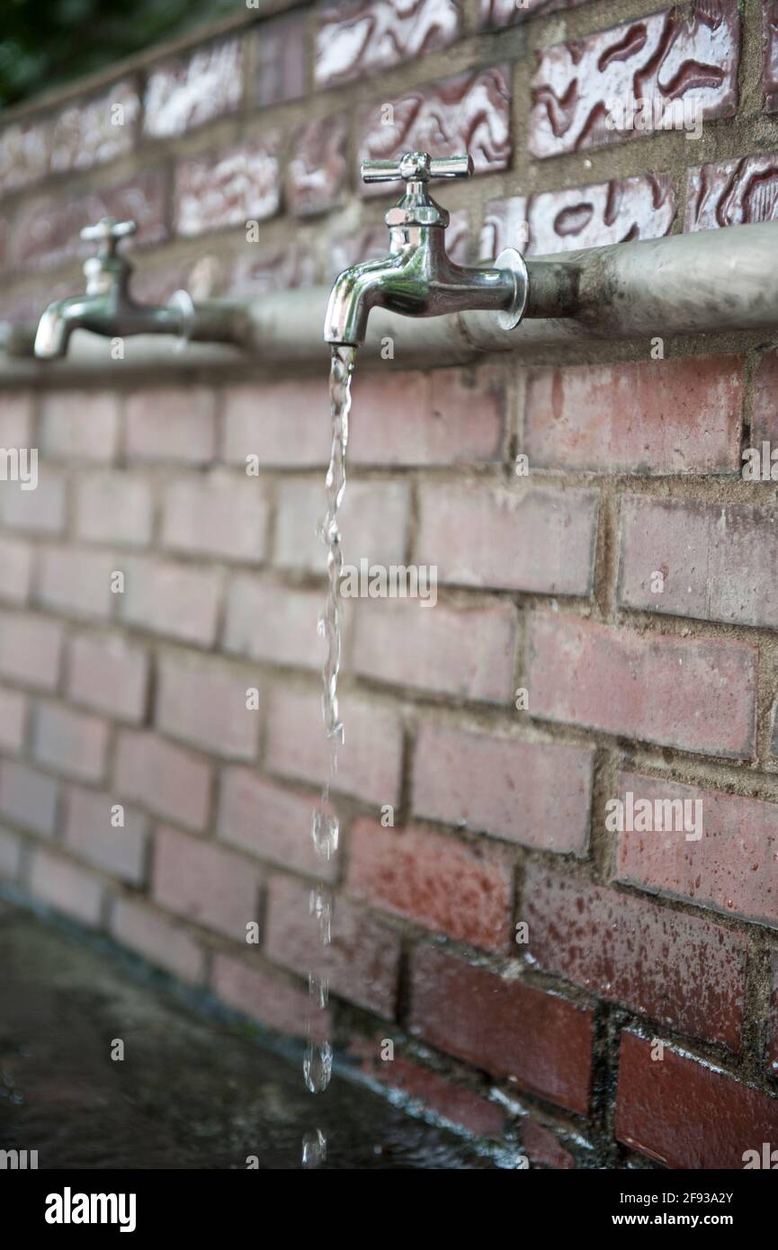 Landscape with clear tap water dripping Stock Photo - Alamy