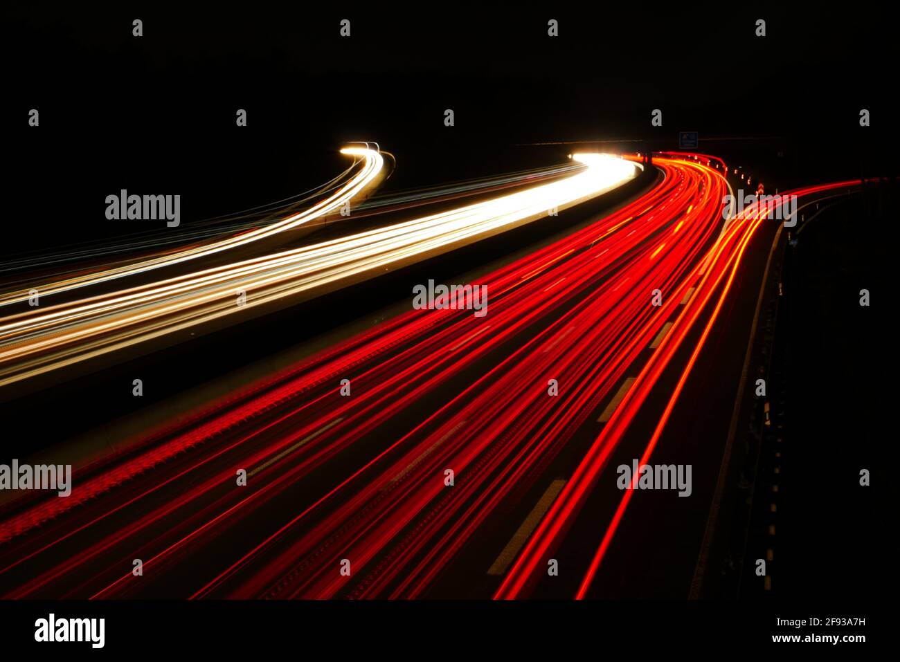 highway at night with exits and bridge Stock Photo - Alamy