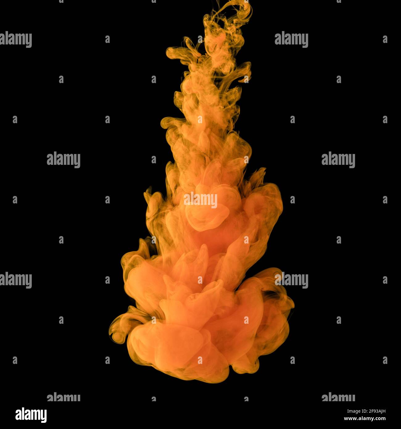 Explosion of colored, fluid and neoned liquids on black studio ...