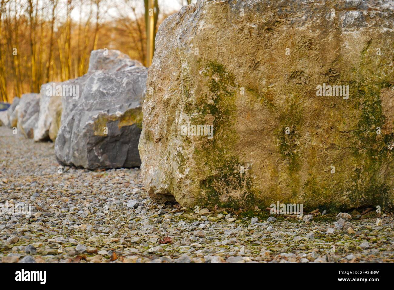 big old stones on a square with gravel stones Stock Photo - Alamy