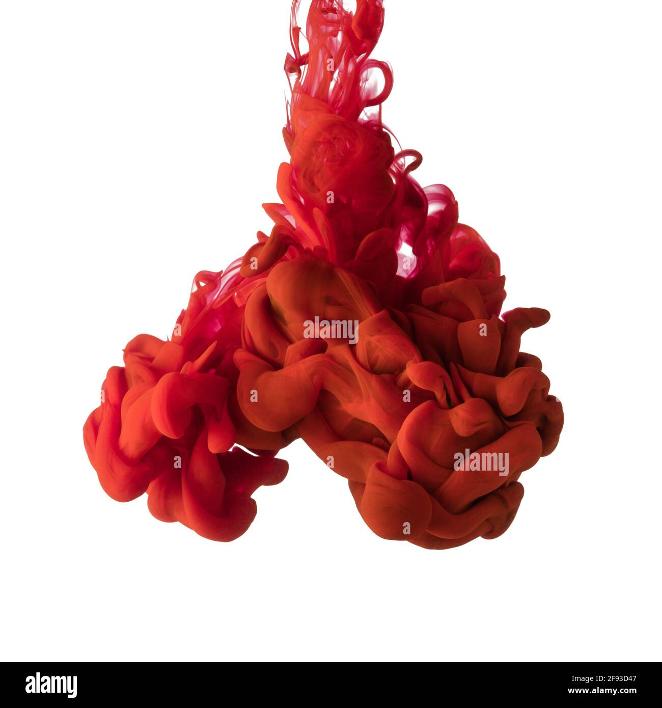 Explosion of colored, fluid and neoned liquids on white studio ...