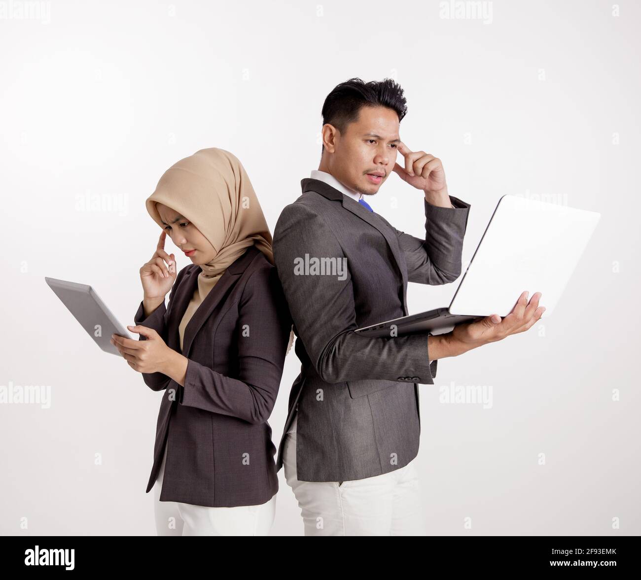 two young business colleagues discussing and thinking projects on ...