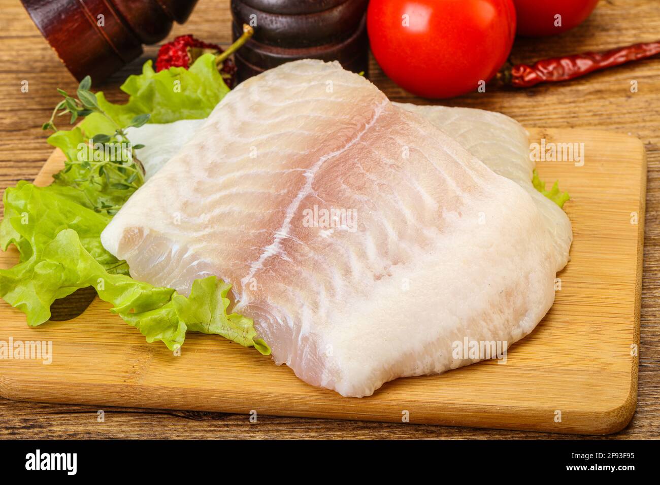 Raw pangasius fillet fish for cooking Stock Photo - Alamy