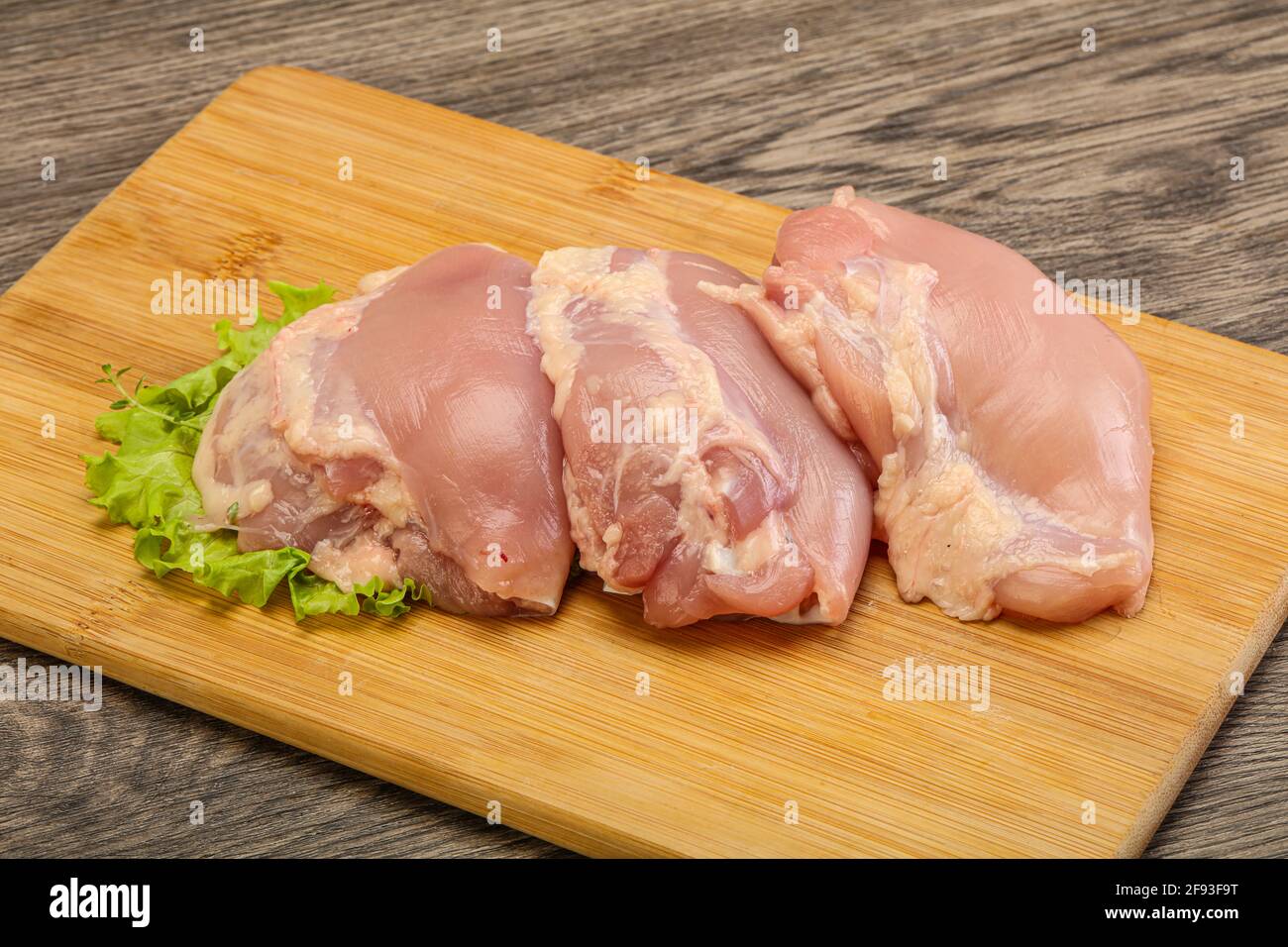 Raw chicken boneless and skinless leg for cooking Stock Photo - Alamy