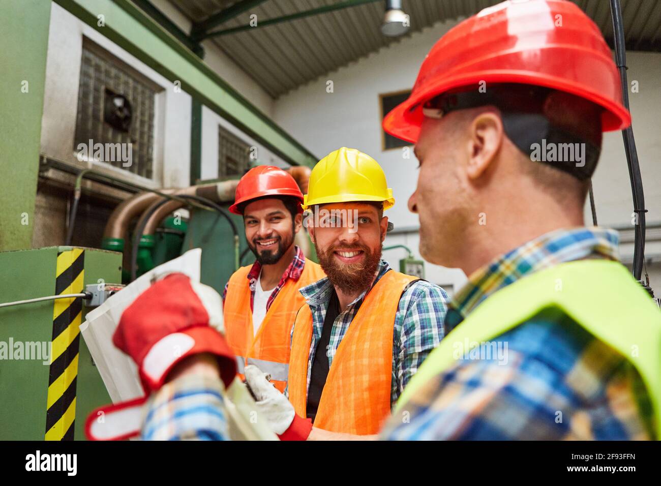 Craftsmen and construction workers team at project planning in the ...