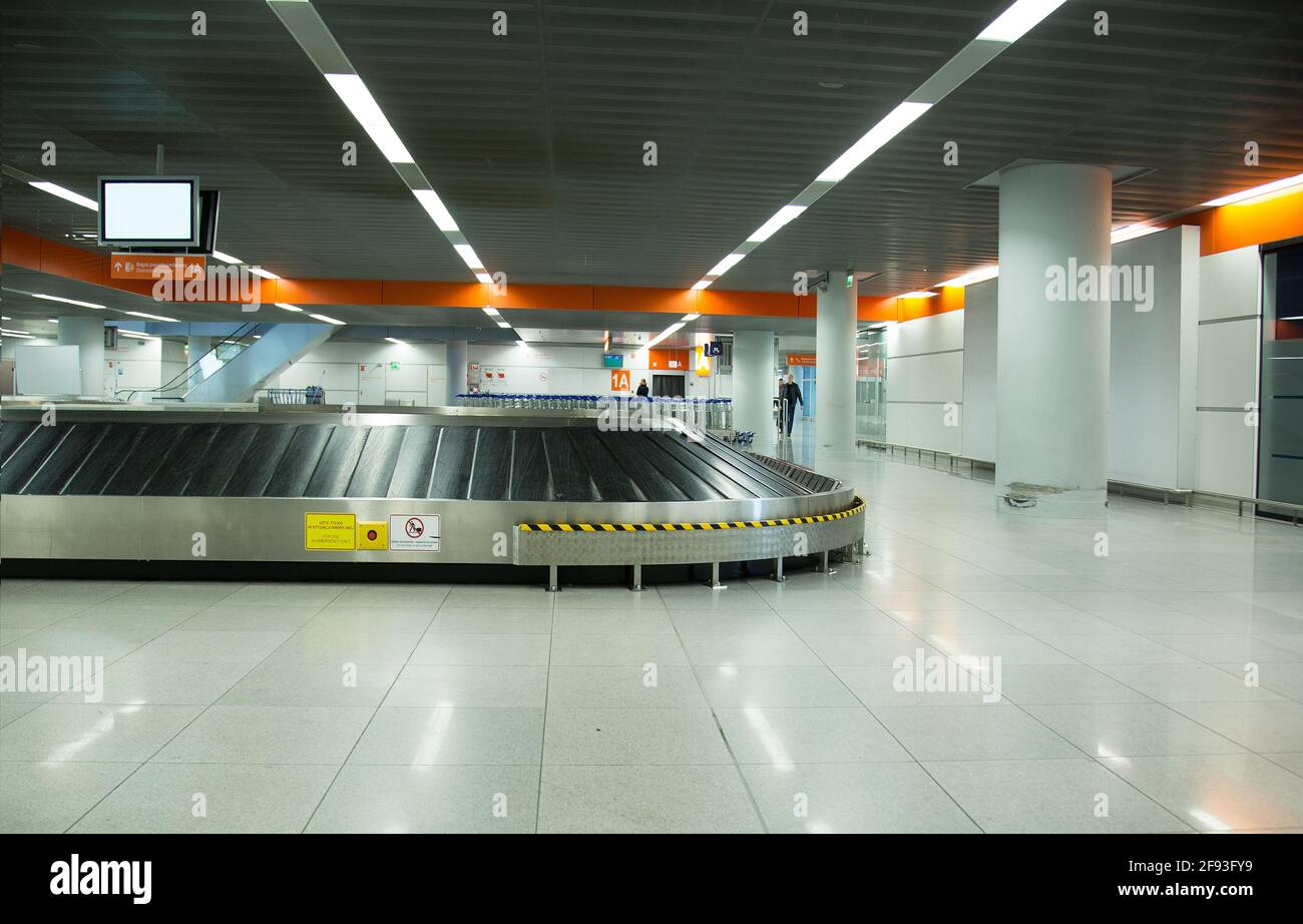 Baggage conveyor empty hall at the airport Stock Photo - Alamy