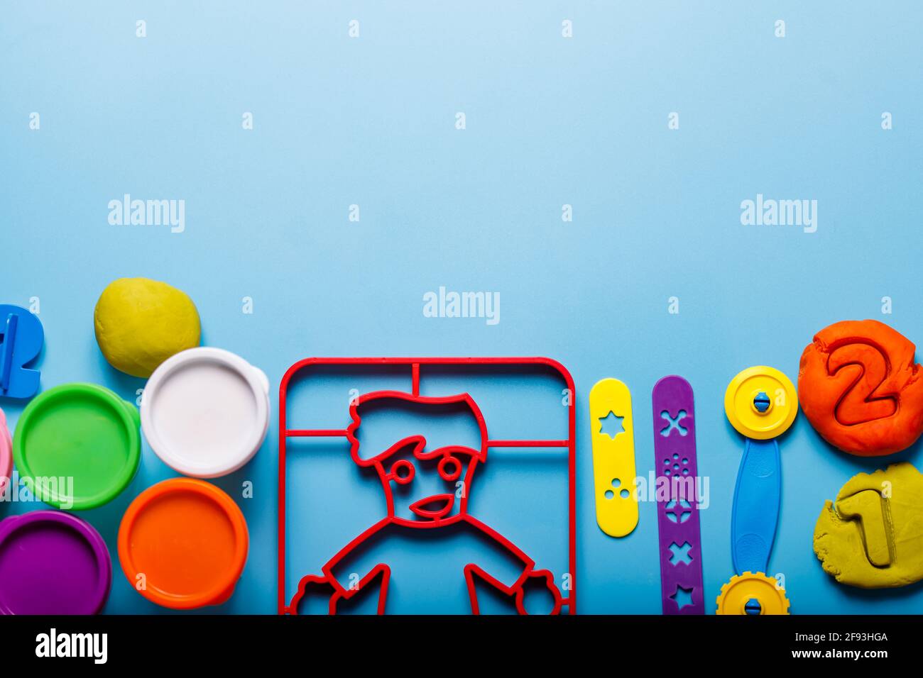 Red and yellow play dough, hi-res stock photography and images - Alamy