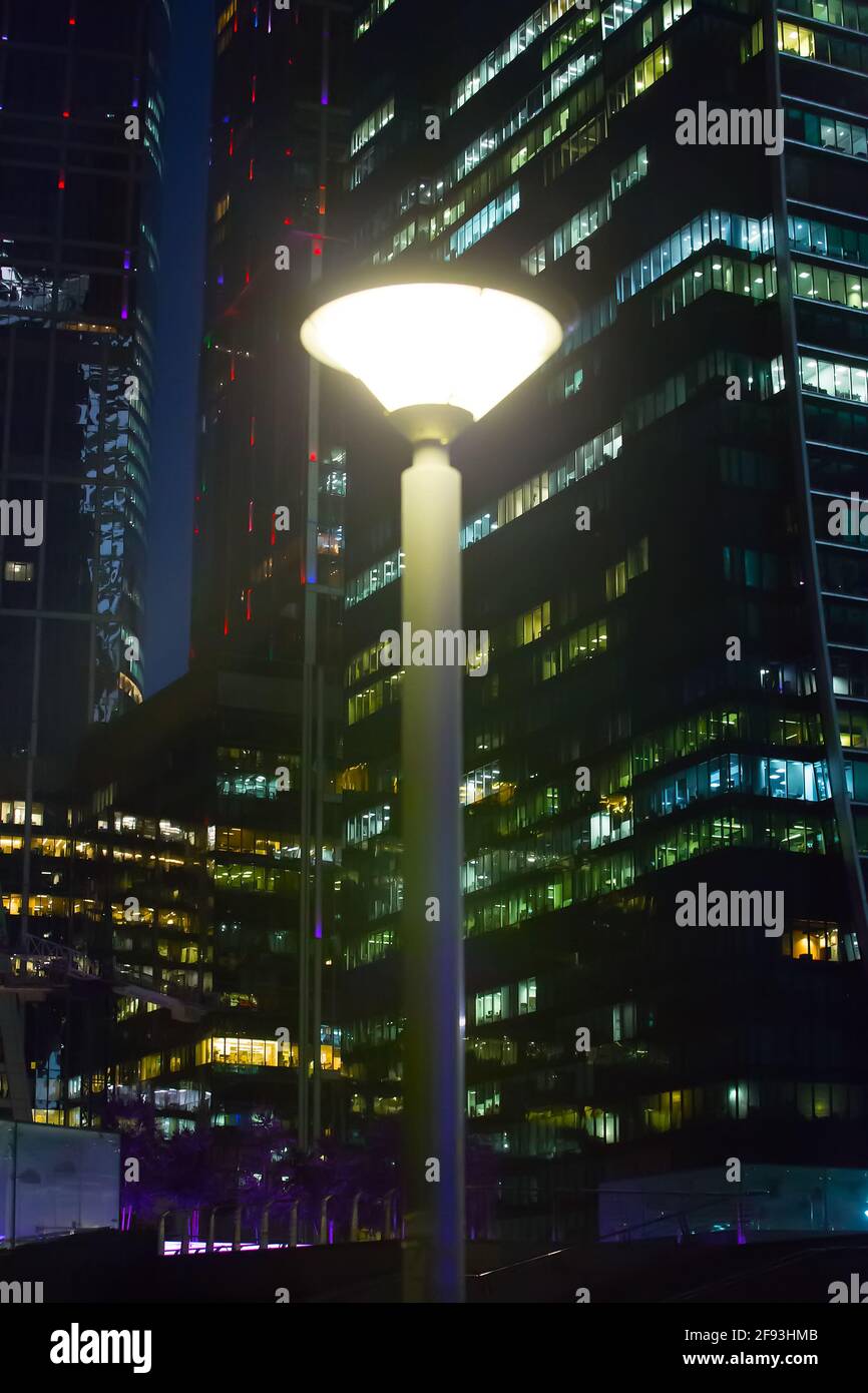 Modern high corporate building at night Stock Photo - Alamy