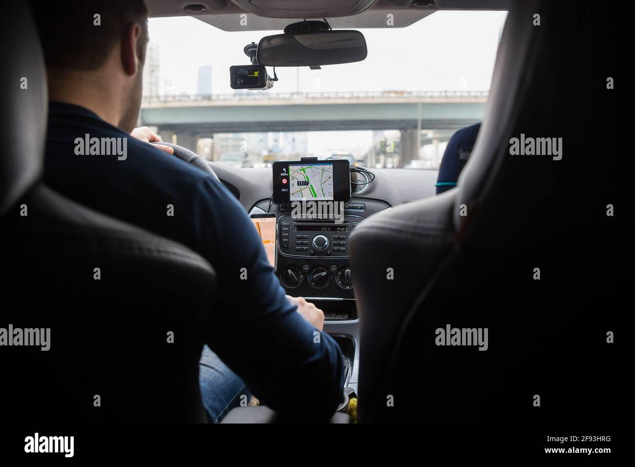 Driver in the car controls the navigator. Close-up part Stock Photo - Alamy