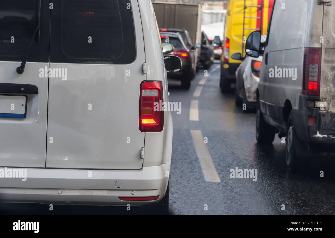 car in a big traffic jam. Back view. Blurred background Stock Photo - Alamy