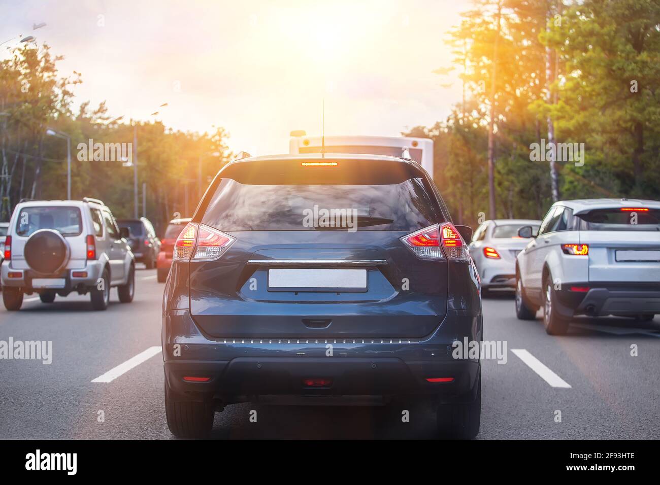 car in a big traffic jam. Back view Stock Photo - Alamy
