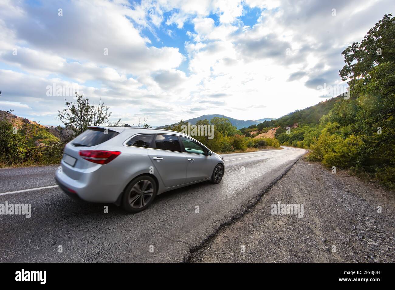 Crossover Rides the Highway in a Beautiful Mountainous Area Stock Photo ...