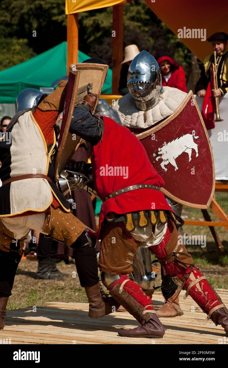 Knight wearing armor and holding sword hi-res stock photography and ...