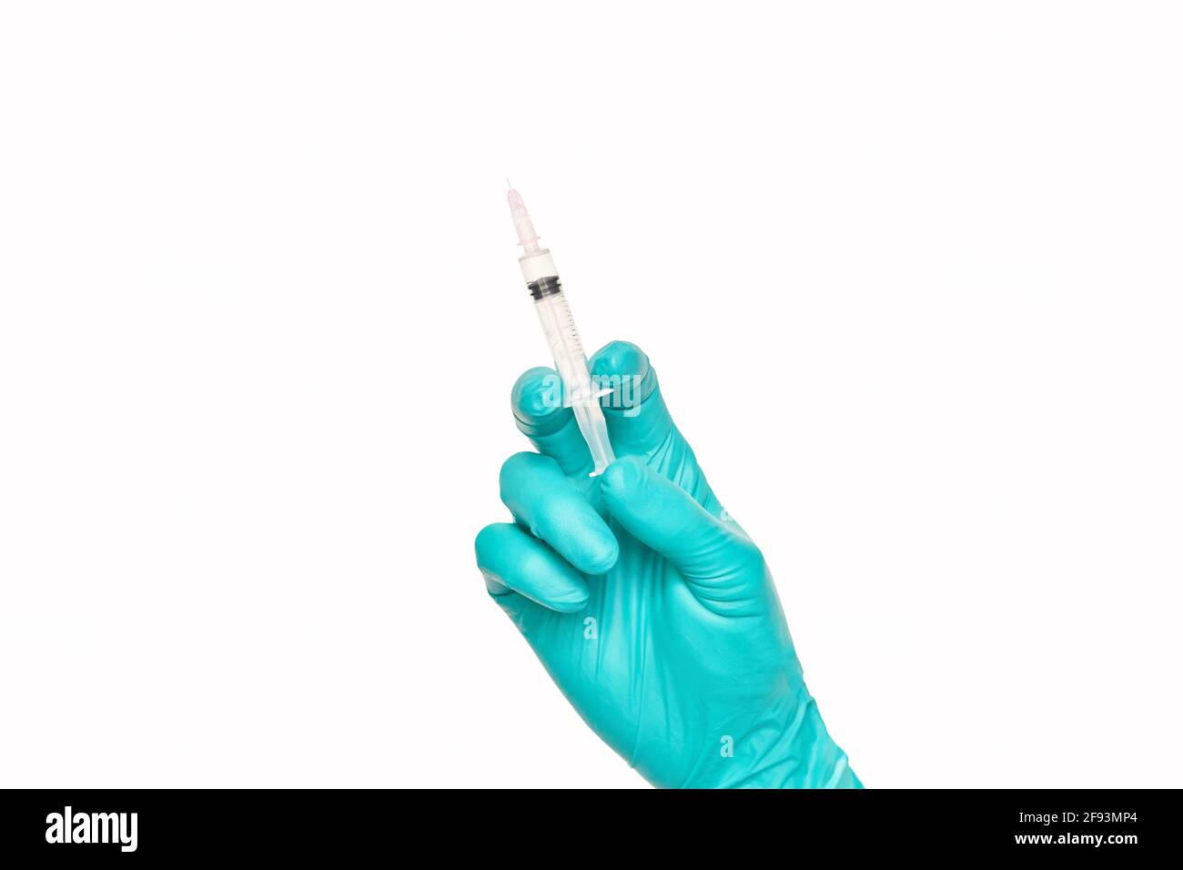 Person in green glove hold vaccine bottle syringe. Injection pharmacy ...