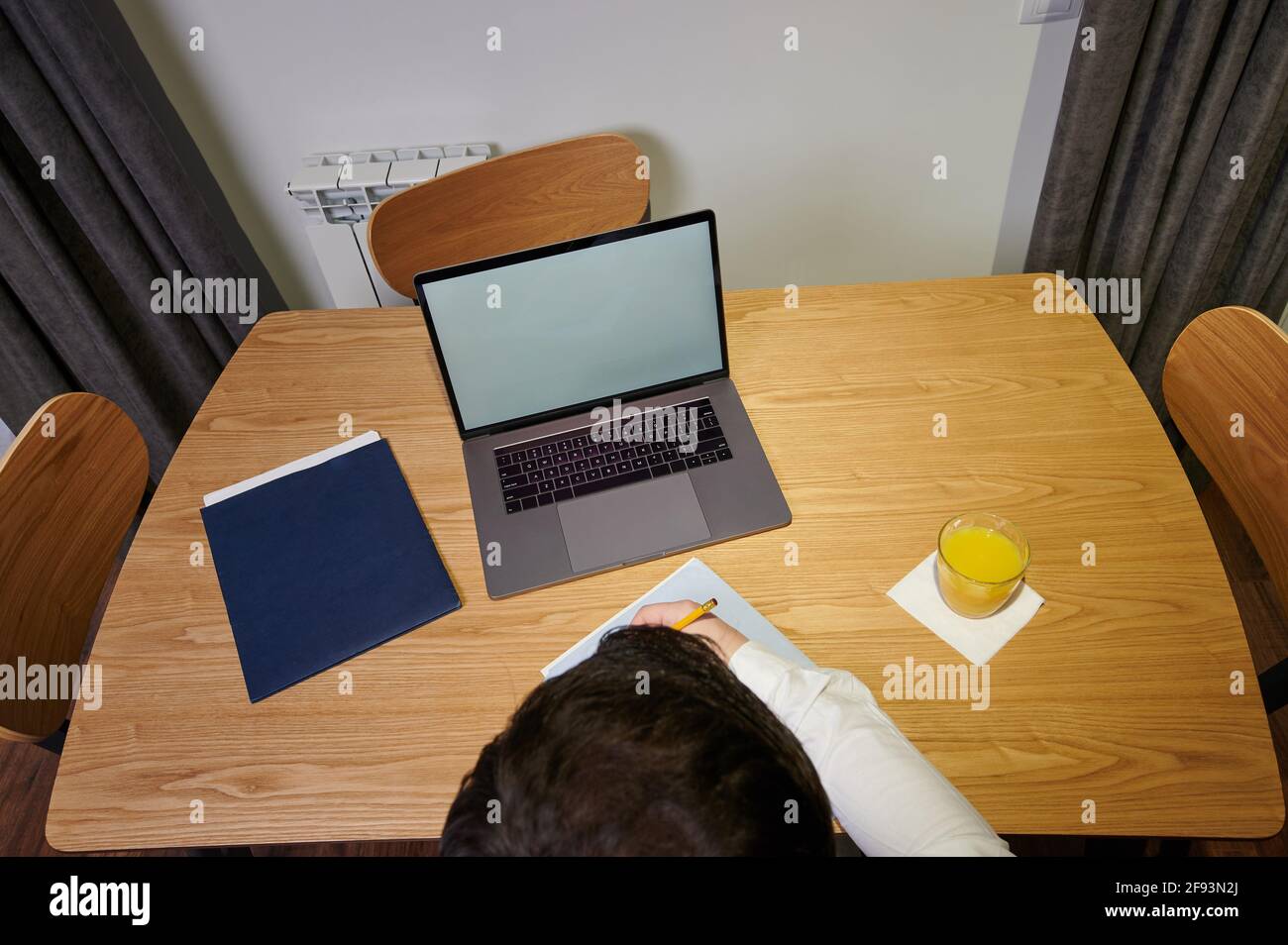 Man working from home theme above top head view Stock Photo - Alamy