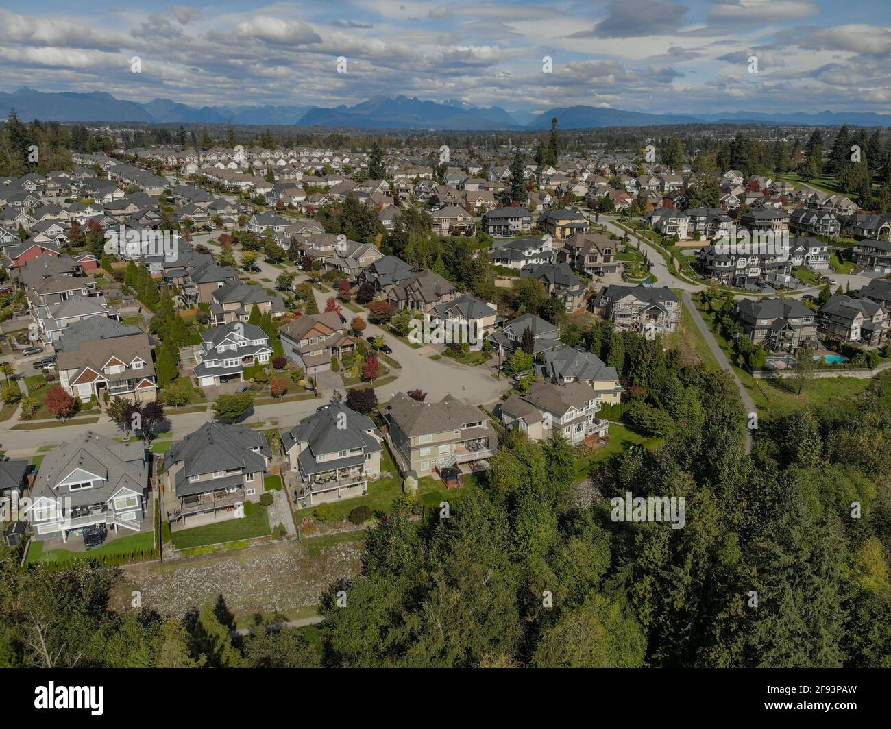 Aerial view of modern houses in a small town surrounded by nature Stock ...