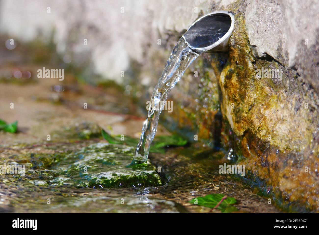 Water flows from large metal hi-res stock photography and images - Alamy