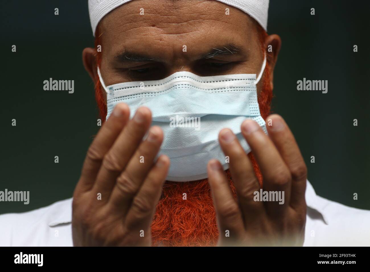 Kathmandu, NE, Nepal. 16th Apr, 2021. A Nepali Muslim offers prayers ...