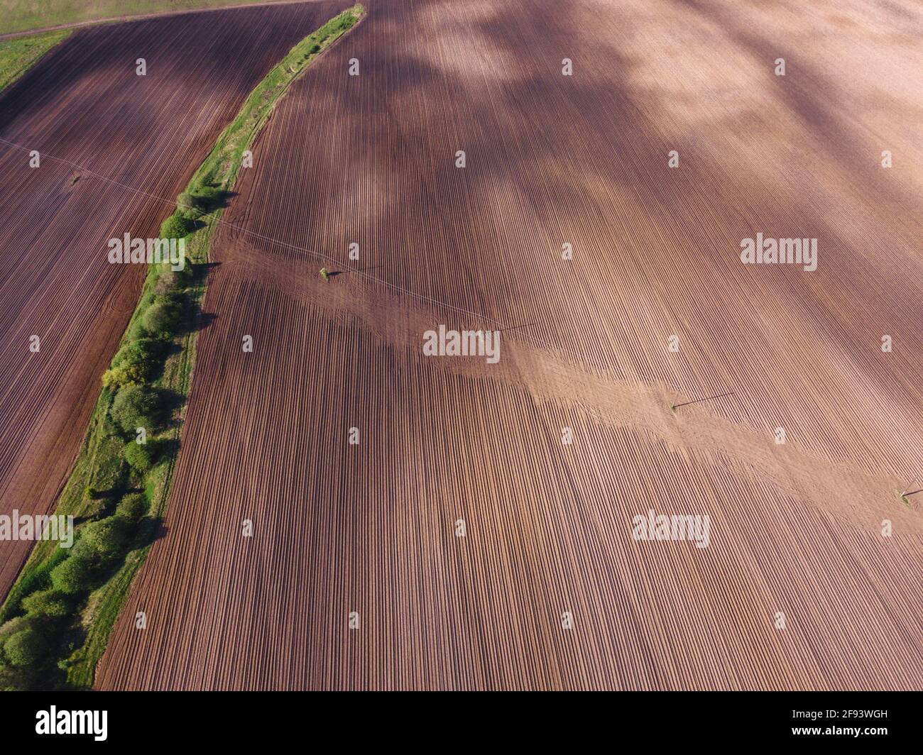 Tractor on plowed field top hi-res stock photography and images - Alamy
