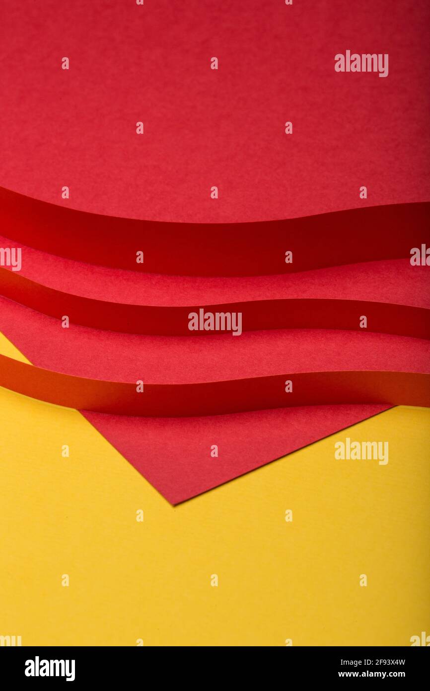 Abstract minimal paper background. Three red cut out paper stripes on ...