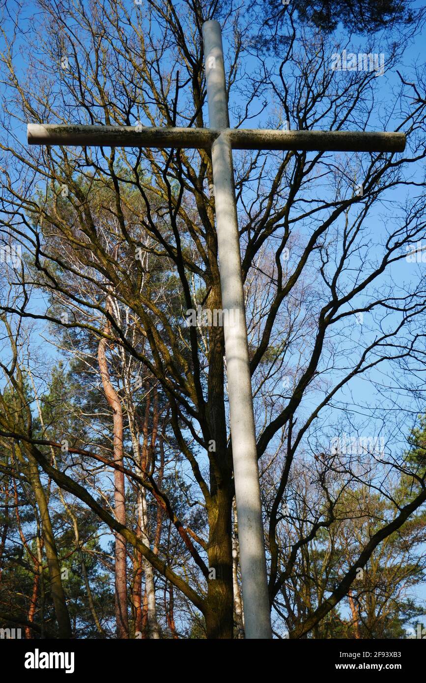 big old christian stone cross in the sunlight in the forest Stock Photo ...