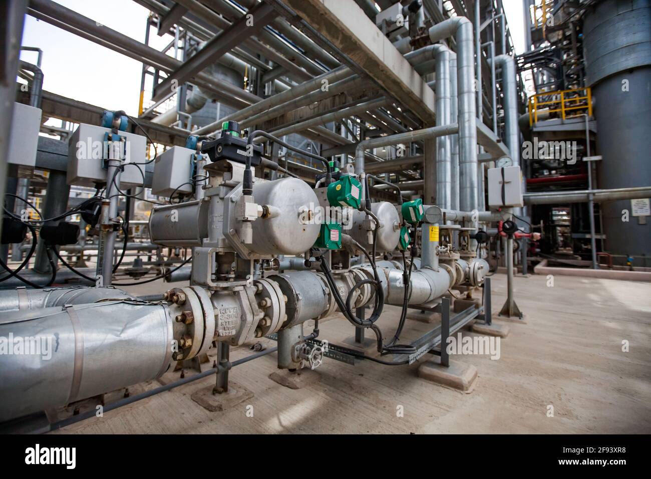 Oil refinery plant. Close up of equipment. Pipes on background Stock ...