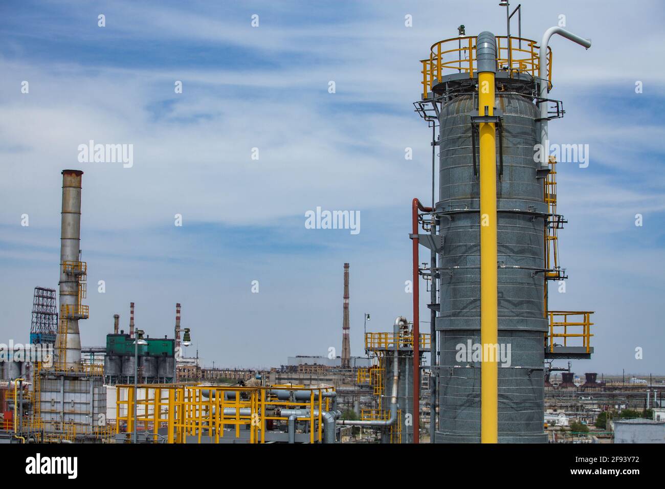 Close-up of oil refinery plant (refinery complex). Distillation columns ...