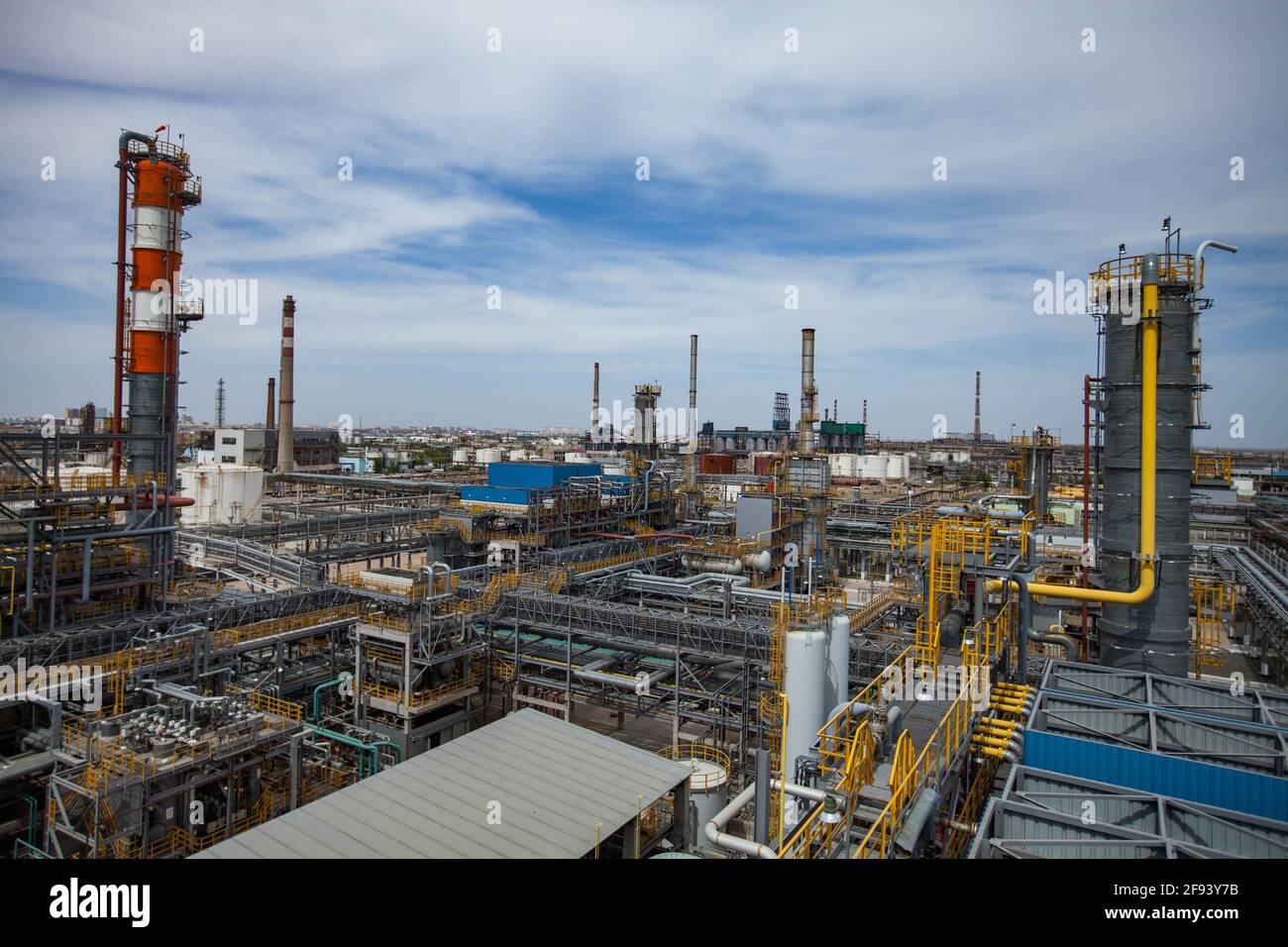 Panorama view. Oil refinery plant in desert. Blue sky with clouds ...