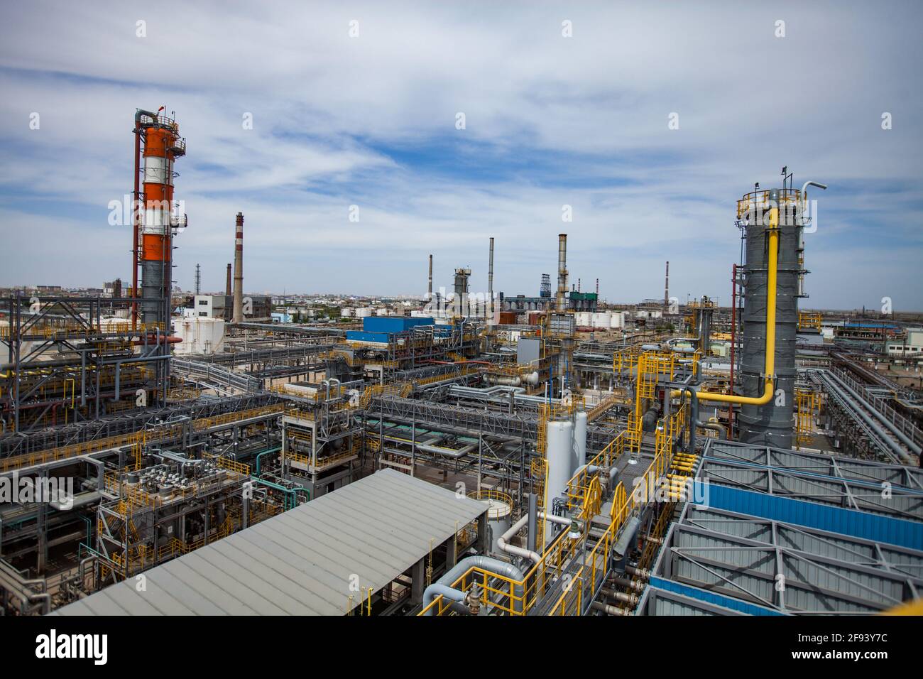 Panorama view. Oil refinery plant in desert. Blue sky with clouds ...