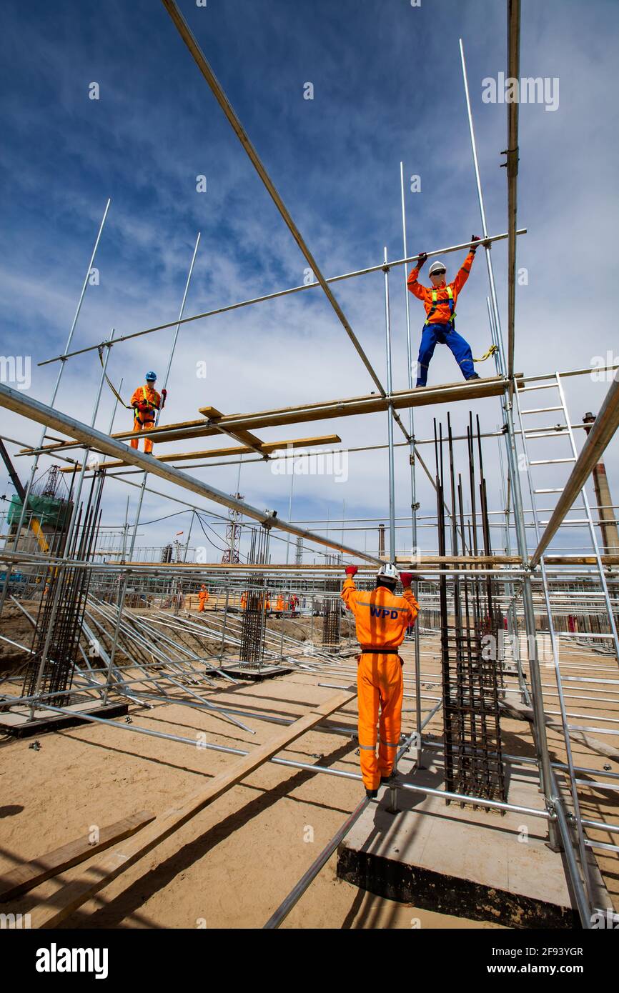 Atyrau/Kazakhstan - May 21 2012: Industrial climbers on assembling ...