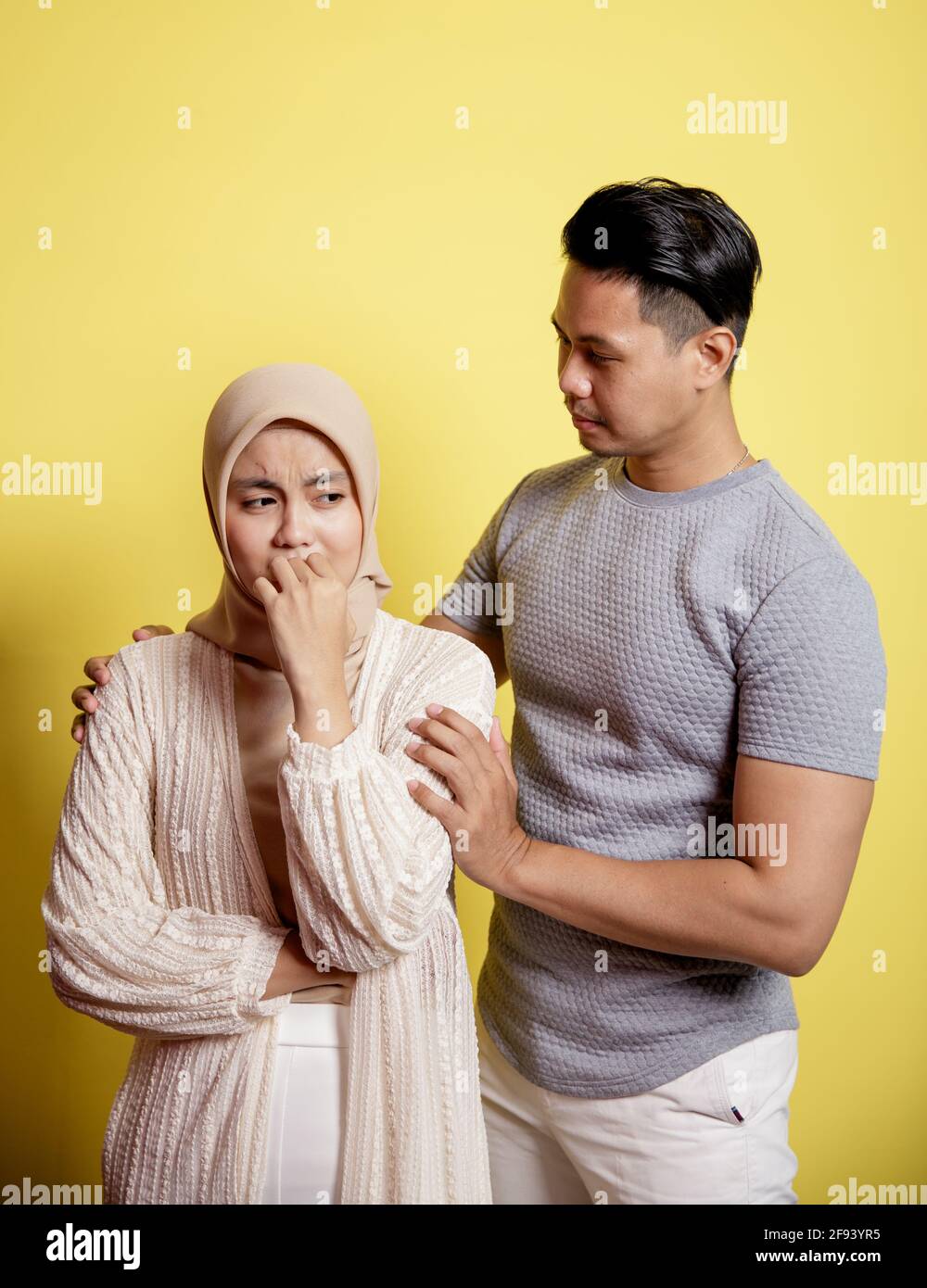 portrait of a sad woman a man calms a woman. Patience everything will ...