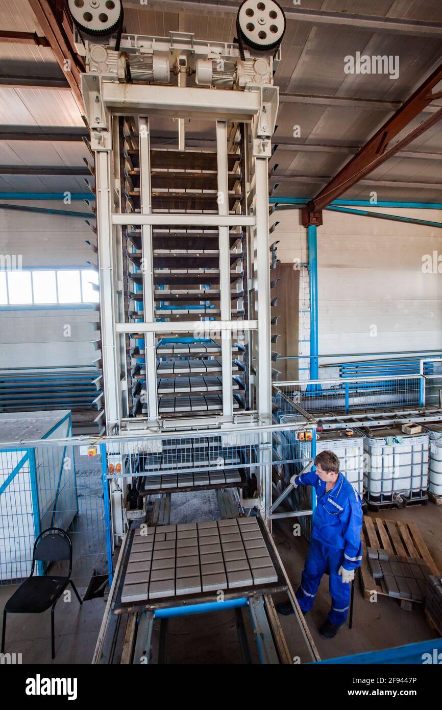 Lifting heavy stone slab hi-res stock photography and images - Alamy